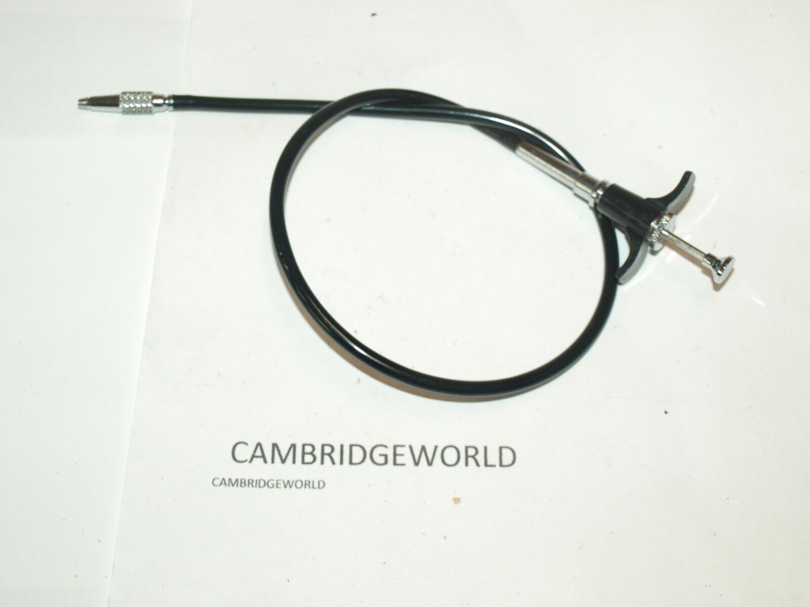 20" inches plastic covered new cable release with AUTO lock MADE in JA